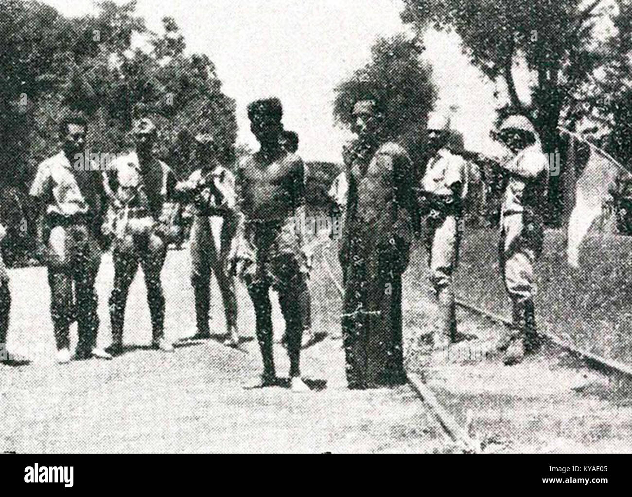 This image depicts a historical scene involving the execution of ...