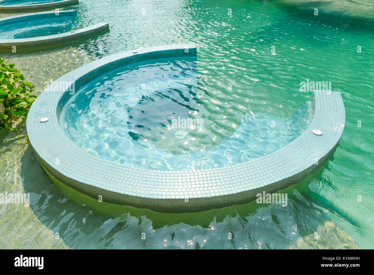 Jacuzzi outdoor blue swimming pool summer vacation Stock Photo - Alamy