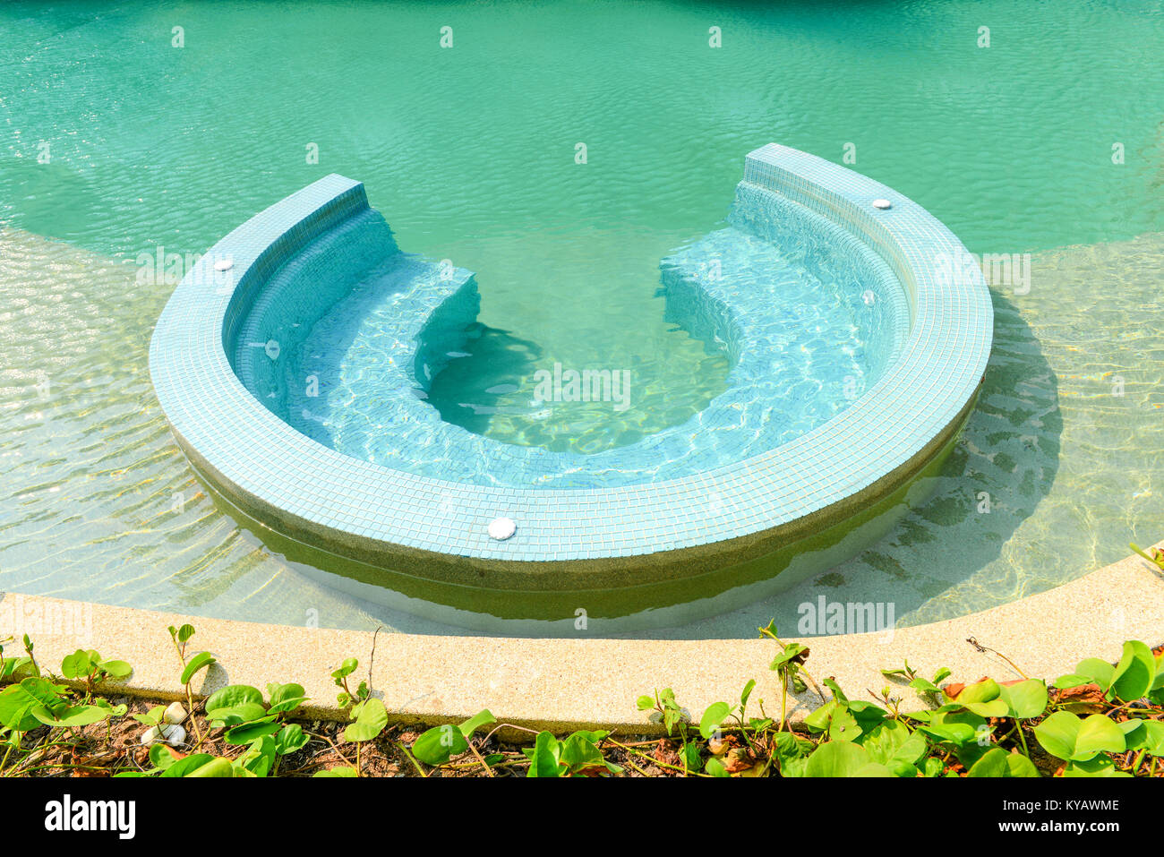 Jacuzzi outdoor blue swimming pool summer vacation Stock Photo - Alamy