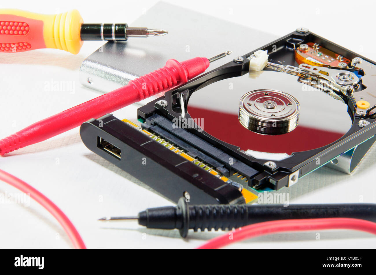 A broken hard disk with repairing and diagnostic tools Stock Photo - Alamy