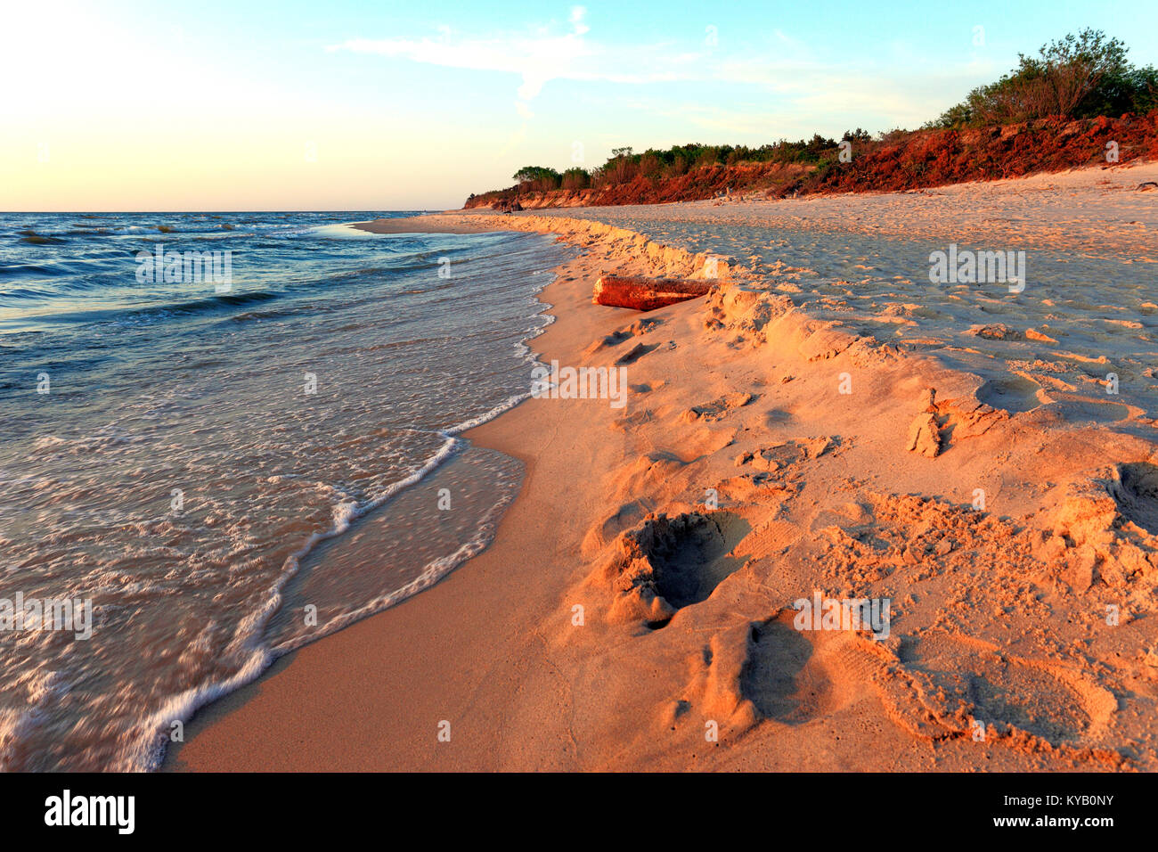 Baltic Sea shore line and beach in Rowy, Poland during sunset Stock ...