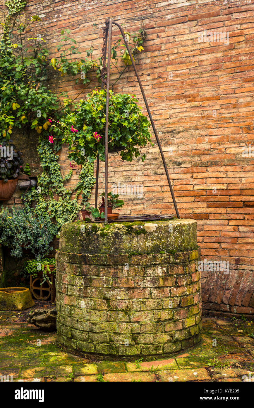 An old medieval water well of a typical medieval small village in ...