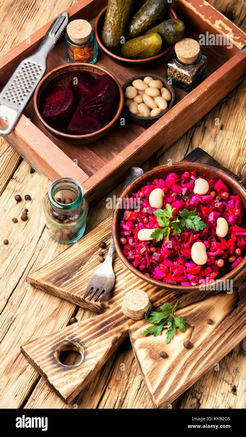 Traditional vegetarian russian beetroot salad vinaigrette in rustic ...