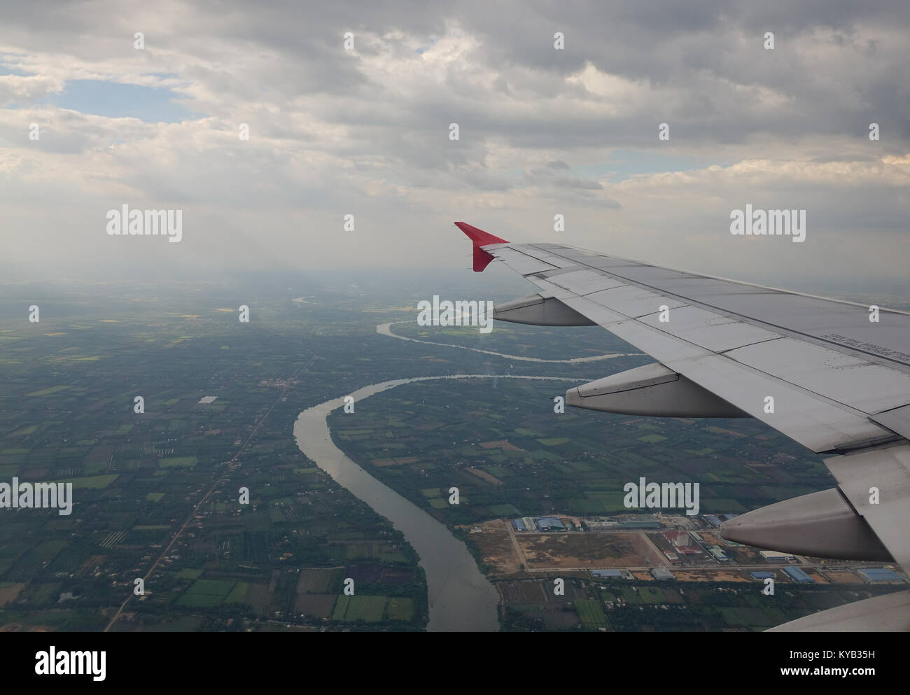 Wing of an airplane. View from airplane window Stock Photo - Alamy