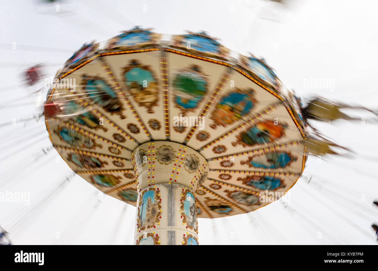Funfair fairground chairoplane ride with motion blur Stock Photo - Alamy