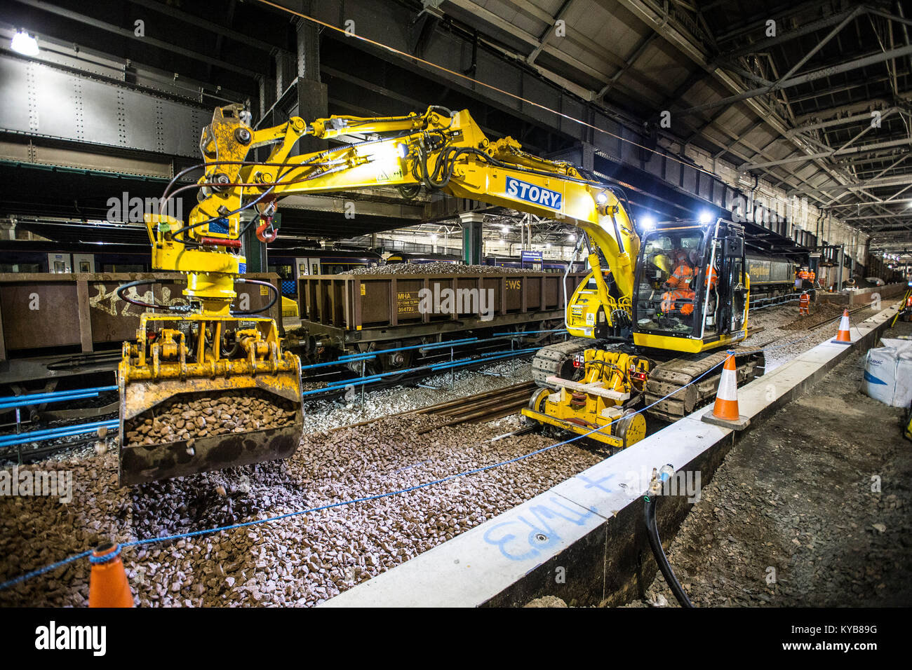 Rail Construction workers working night shift Stock Photo - Alamy