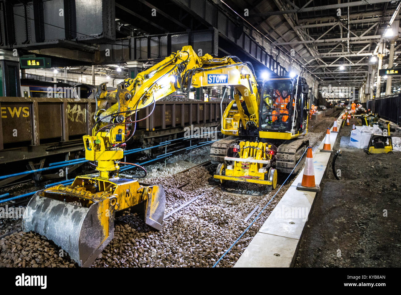 Rail Construction workers working night shift Stock Photo - Alamy