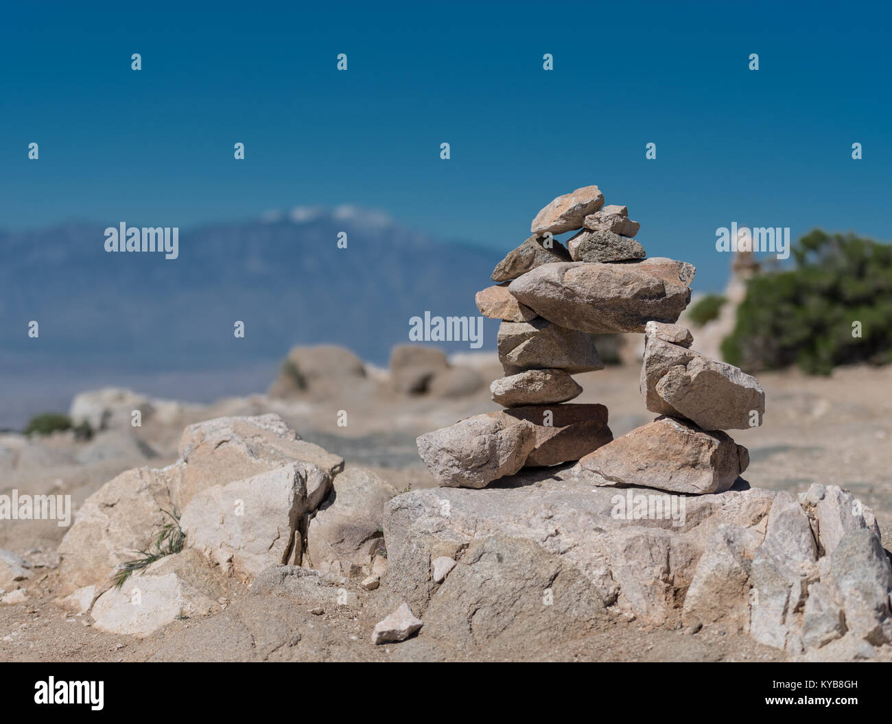 Small Stacked Stone Arch on Mountain Top Stock Photo - Alamy