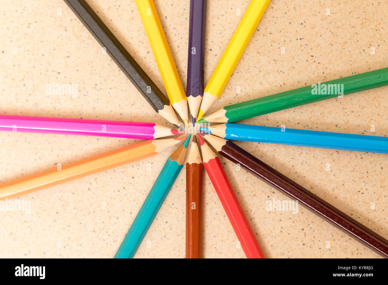 Ring of pencils isolated on a light background Stock Photo - Alamy