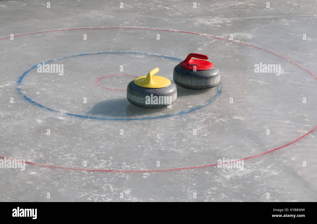 Curling stone on the ice Stock Photo - Alamy