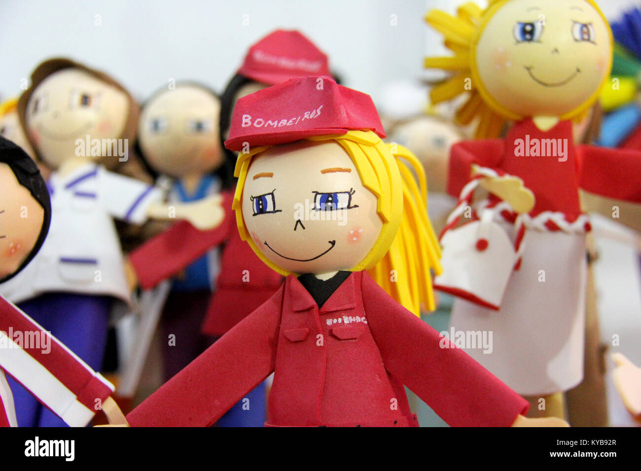 Selection of colorful handmade puppet dolls. The ones with the red hats ...