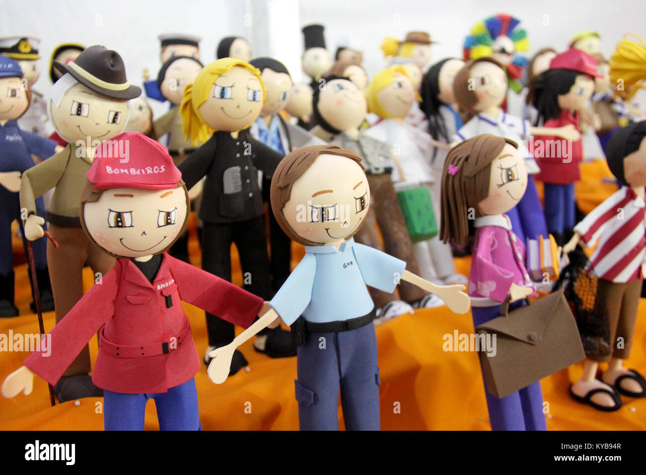 Selection of colorful handmade puppet dolls. The ones with the red hats ...