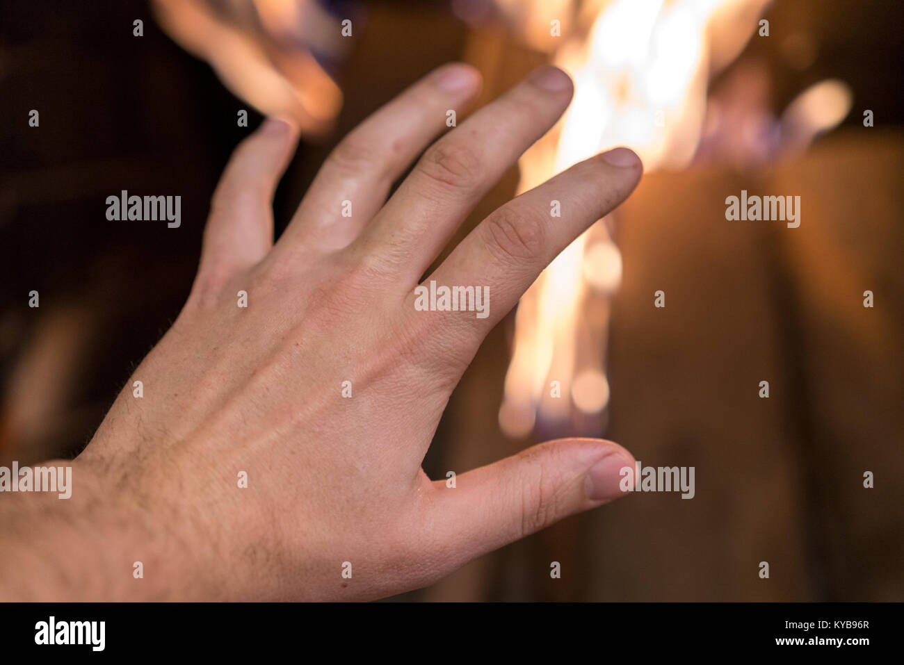 Warming hands gas fire hi-res stock photography and images - Alamy