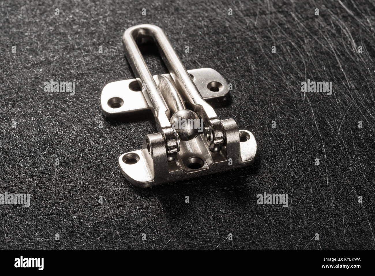 studio shoot of stainless steel safety latch opened Stock Photo - Alamy
