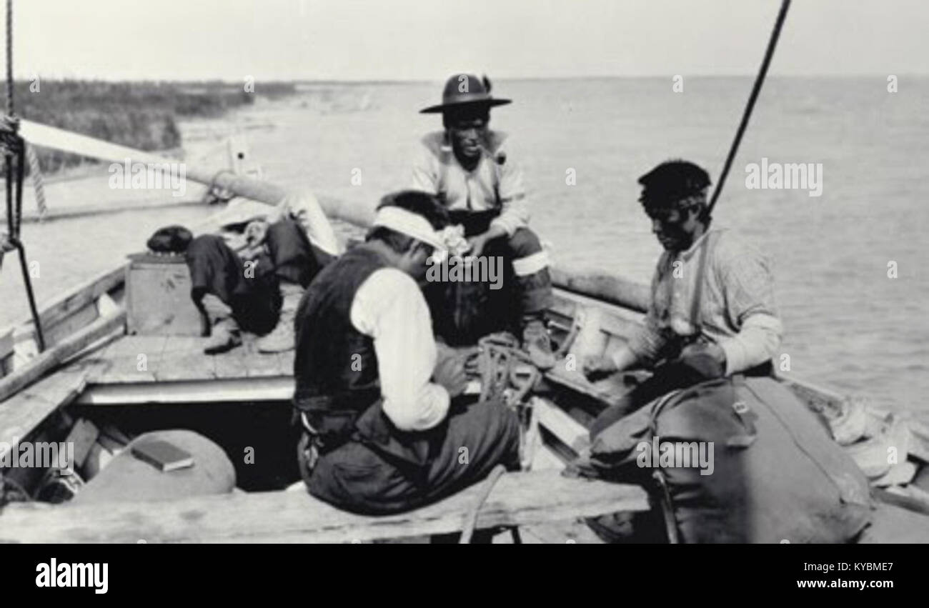 Natives from Dogrib First Nation, on a York boat in 1913 Stock Photo ...