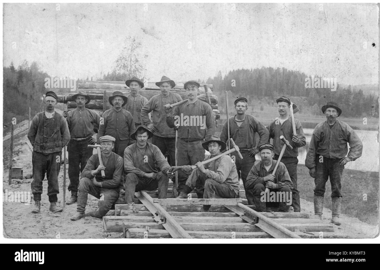 A historical image of Swedish navvies working on infrastructure ...