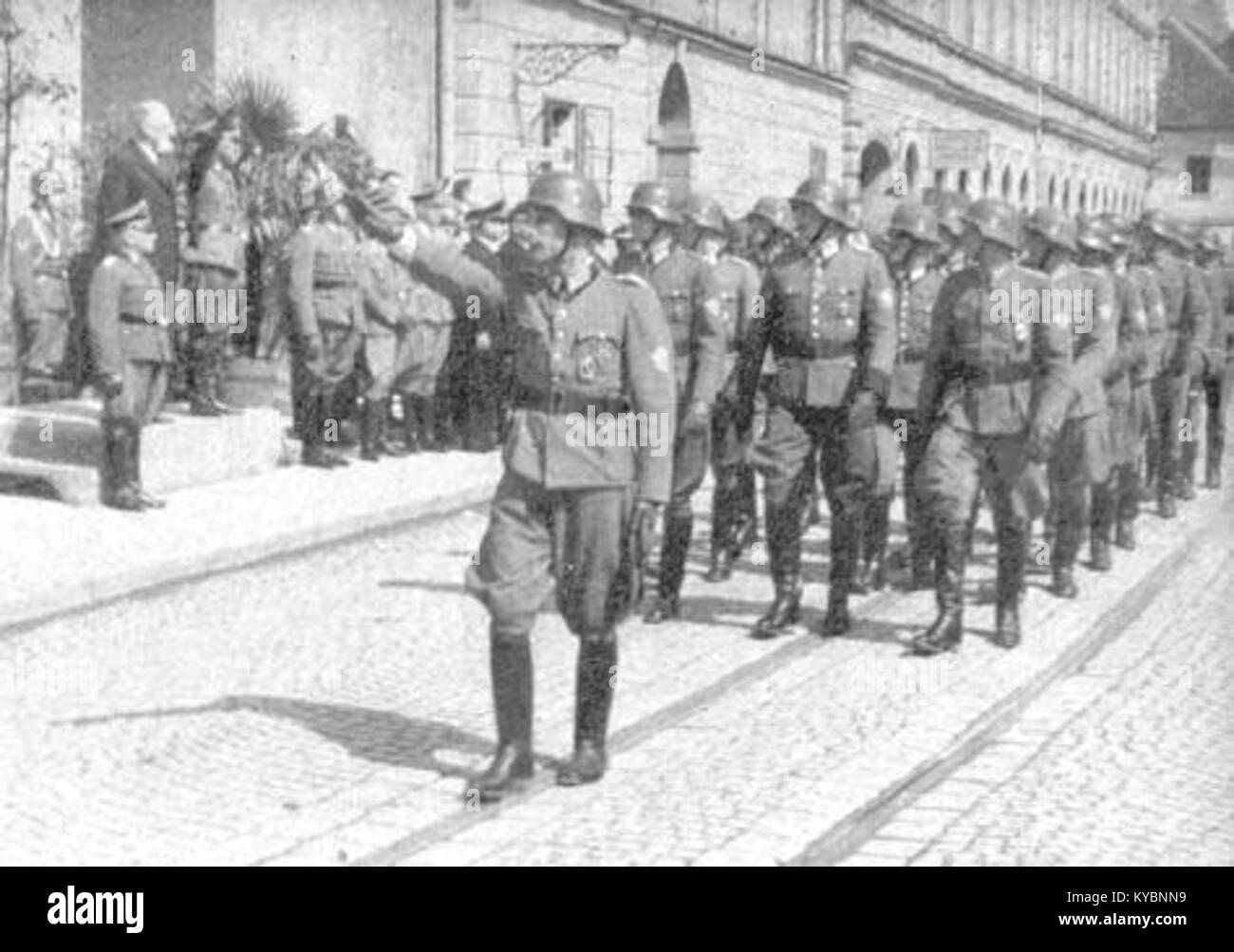 The photograph shows German officers at a military parade in Ljubljana ...