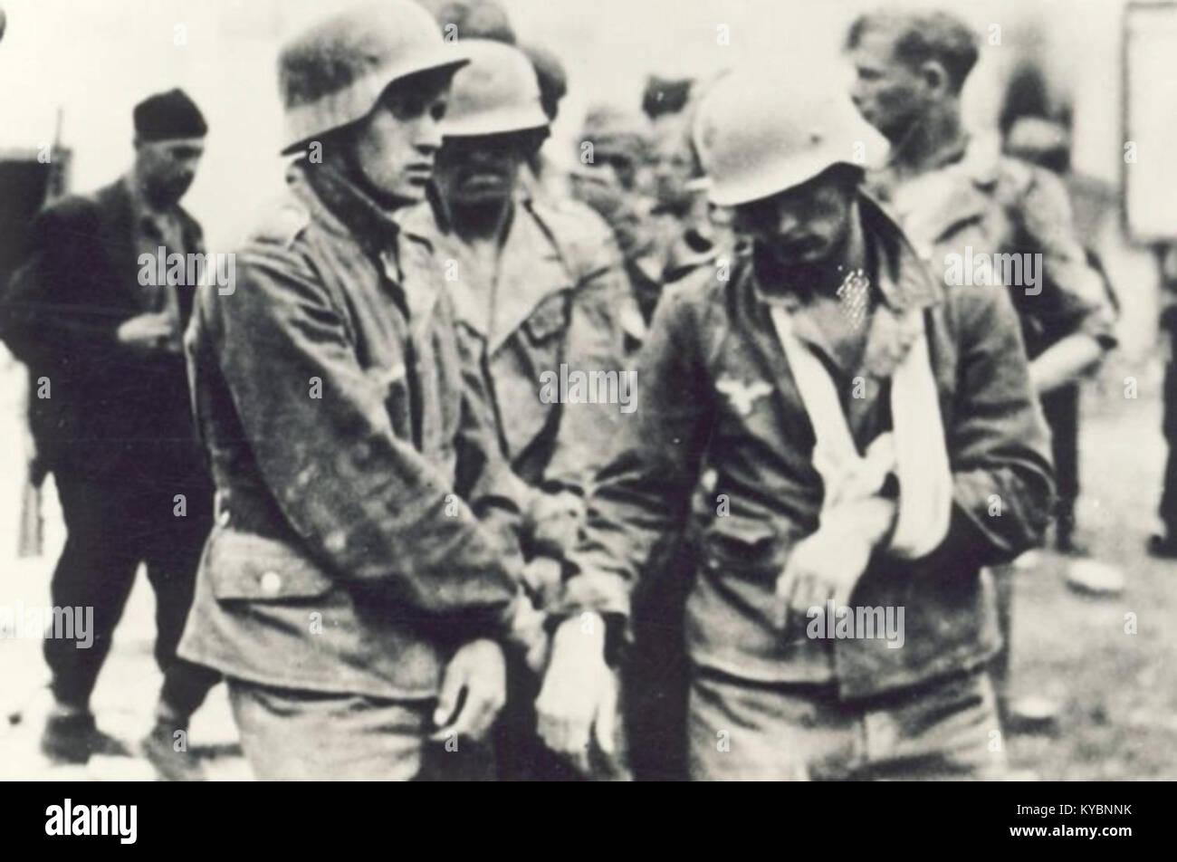 This historical image depicts German prisoners of war after the ...