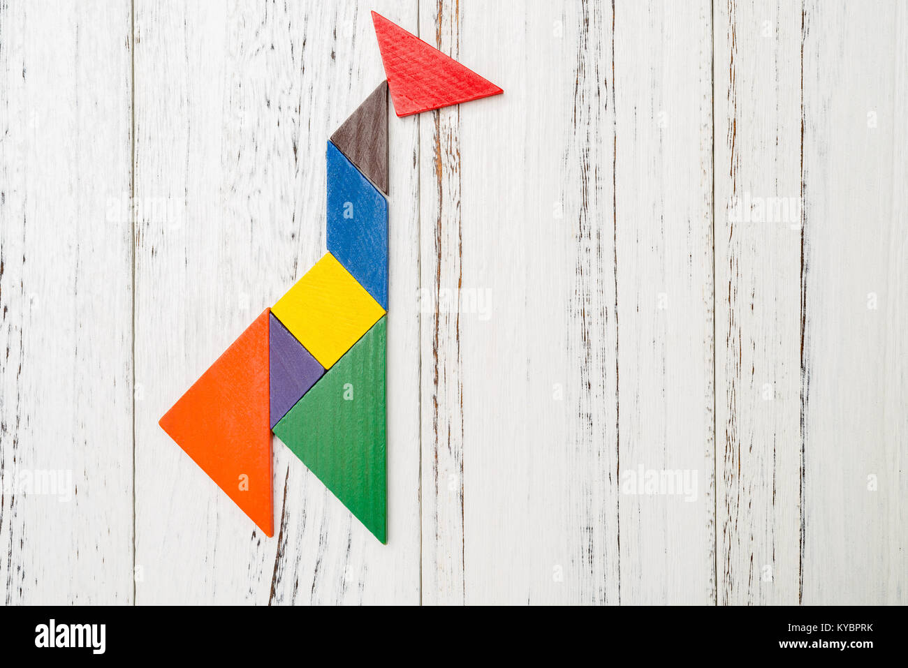 wooden tangram shaped like a giraffe with copy space Stock Photo - Alamy