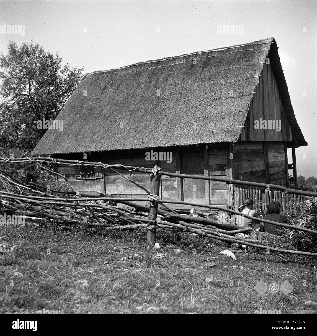 A 1956 photograph of a modern wooden house built using interlocking log ...