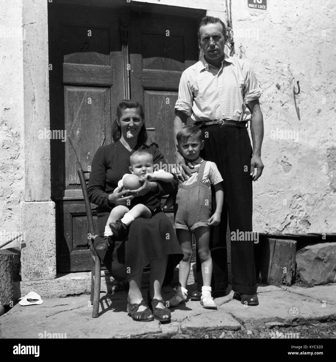 A 1955 family photograph of the Oštir family in Male Loče, Slovenia ...