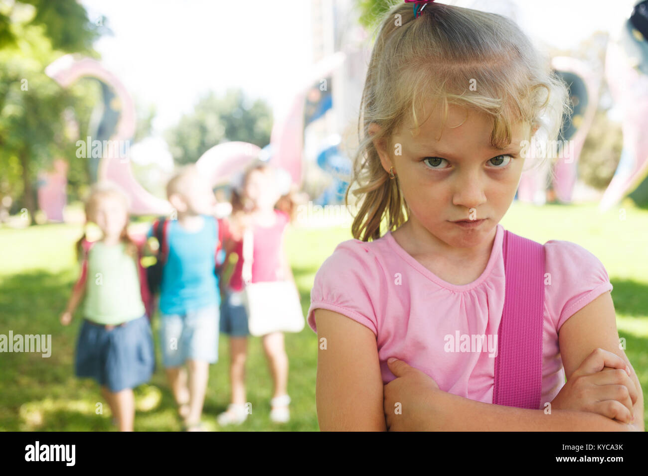Sad lonely child being bullied by children Stock Photo - Alamy