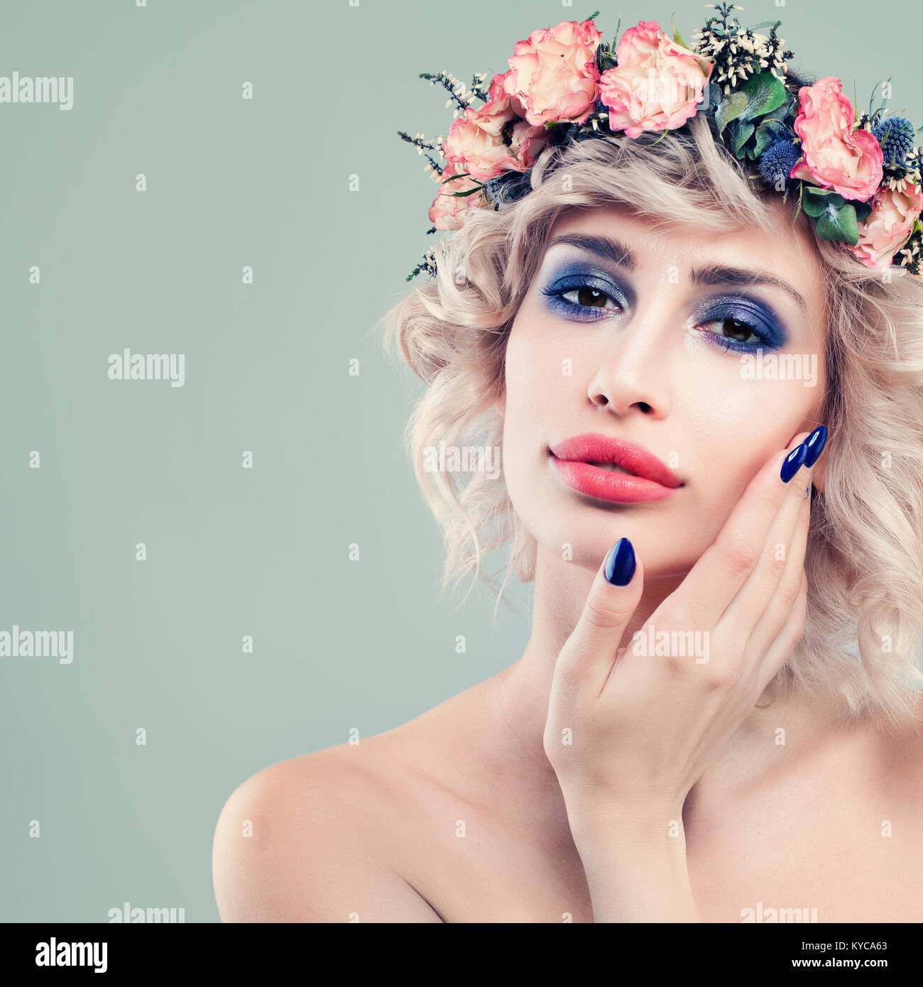 Beautiful Lady Fashion Model with Roses Flowers and Green Leaves in her ...