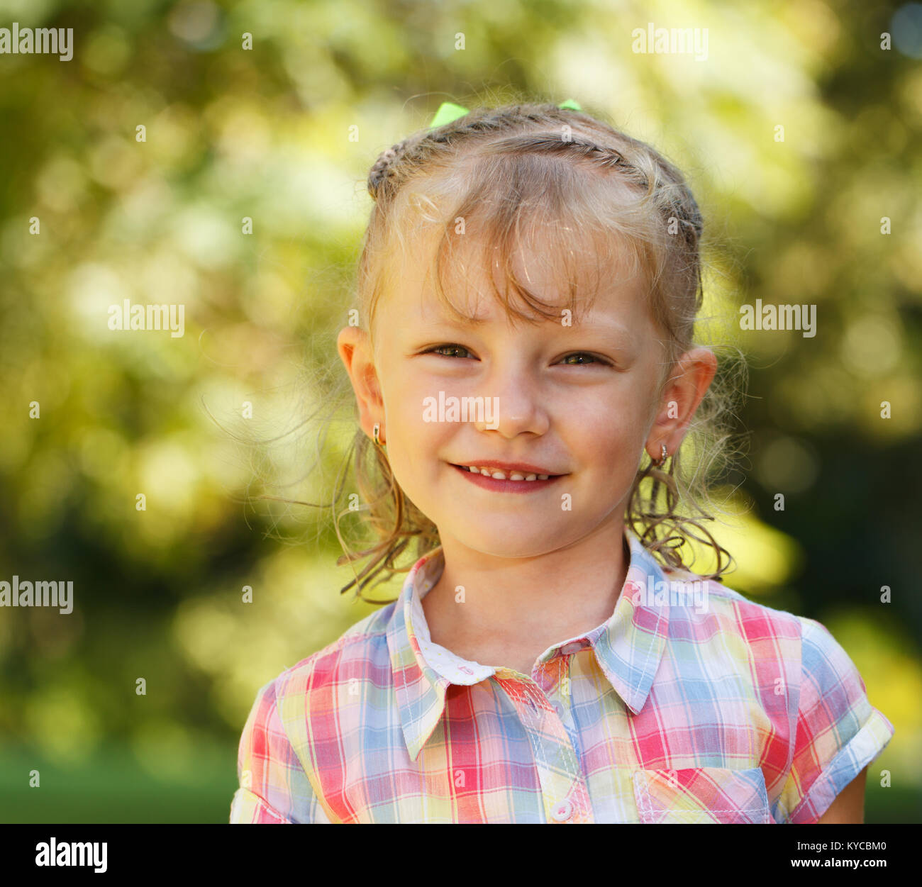 A beautiful little girl with sweet smile Stock Photo - Alamy