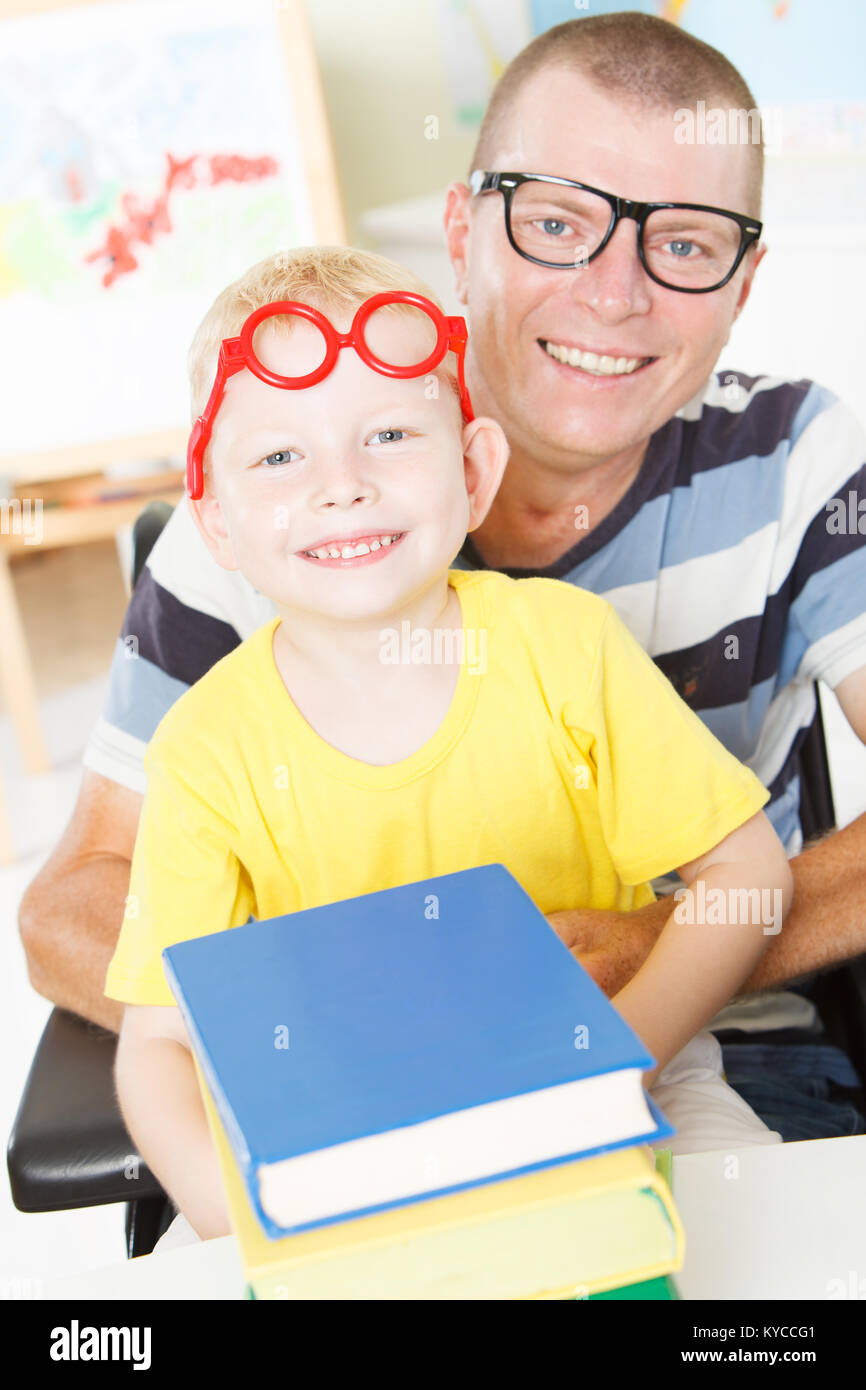 Two children reading classroom together hi-res stock photography and ...
