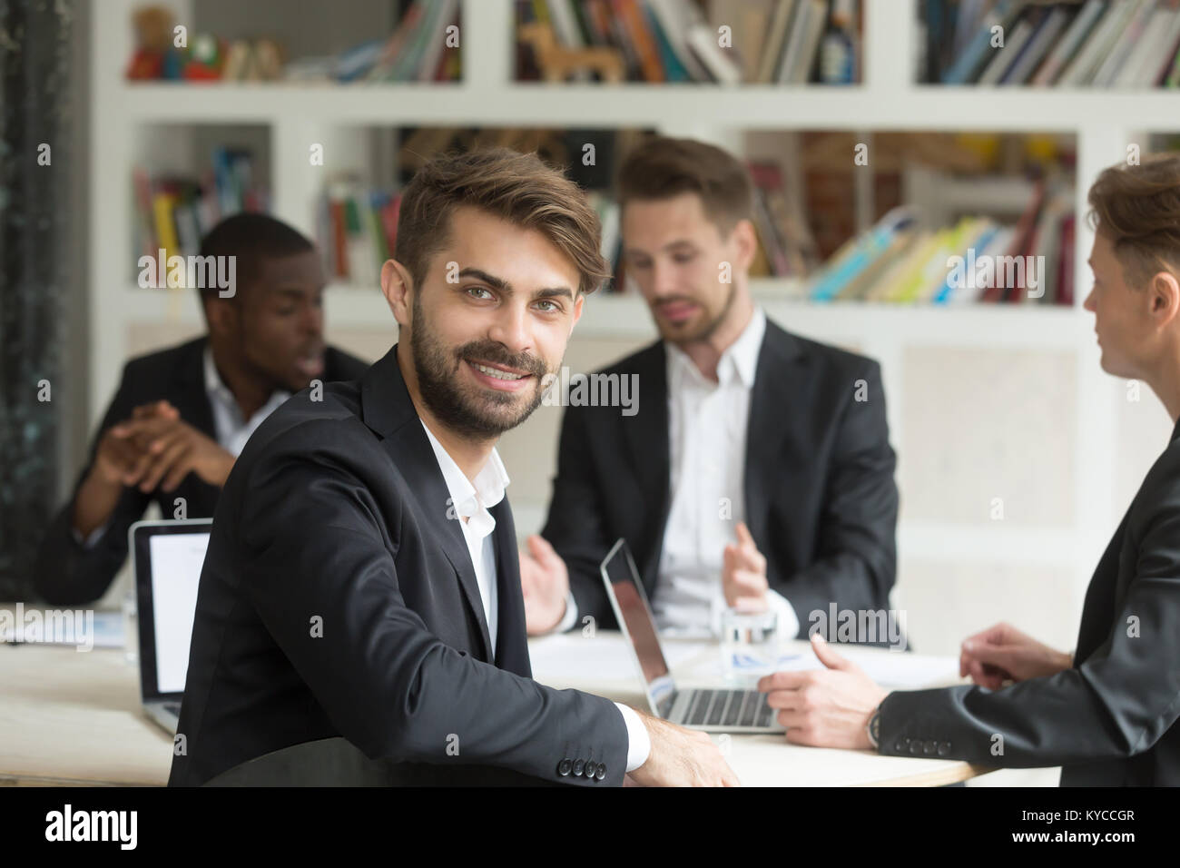 Group successful positive smiling hi-res stock photography and images ...