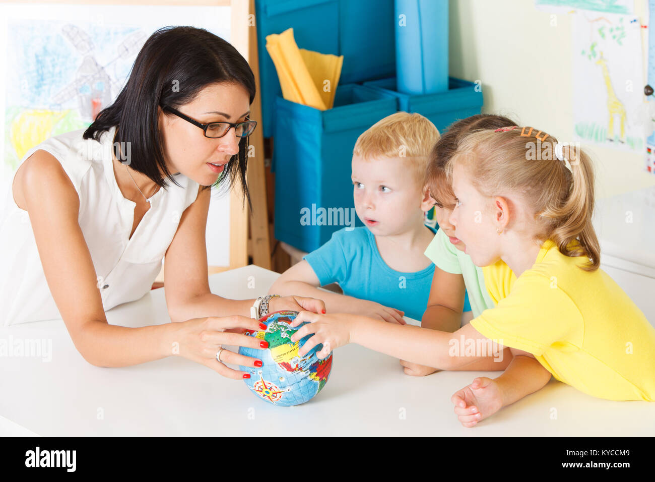 Preschool classroom children table hi-res stock photography and images ...