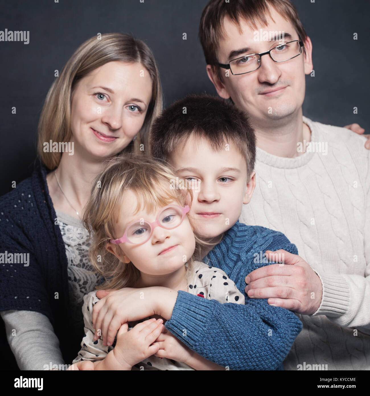 Little Children with Mother and Father. Family Stock Photo - Alamy
