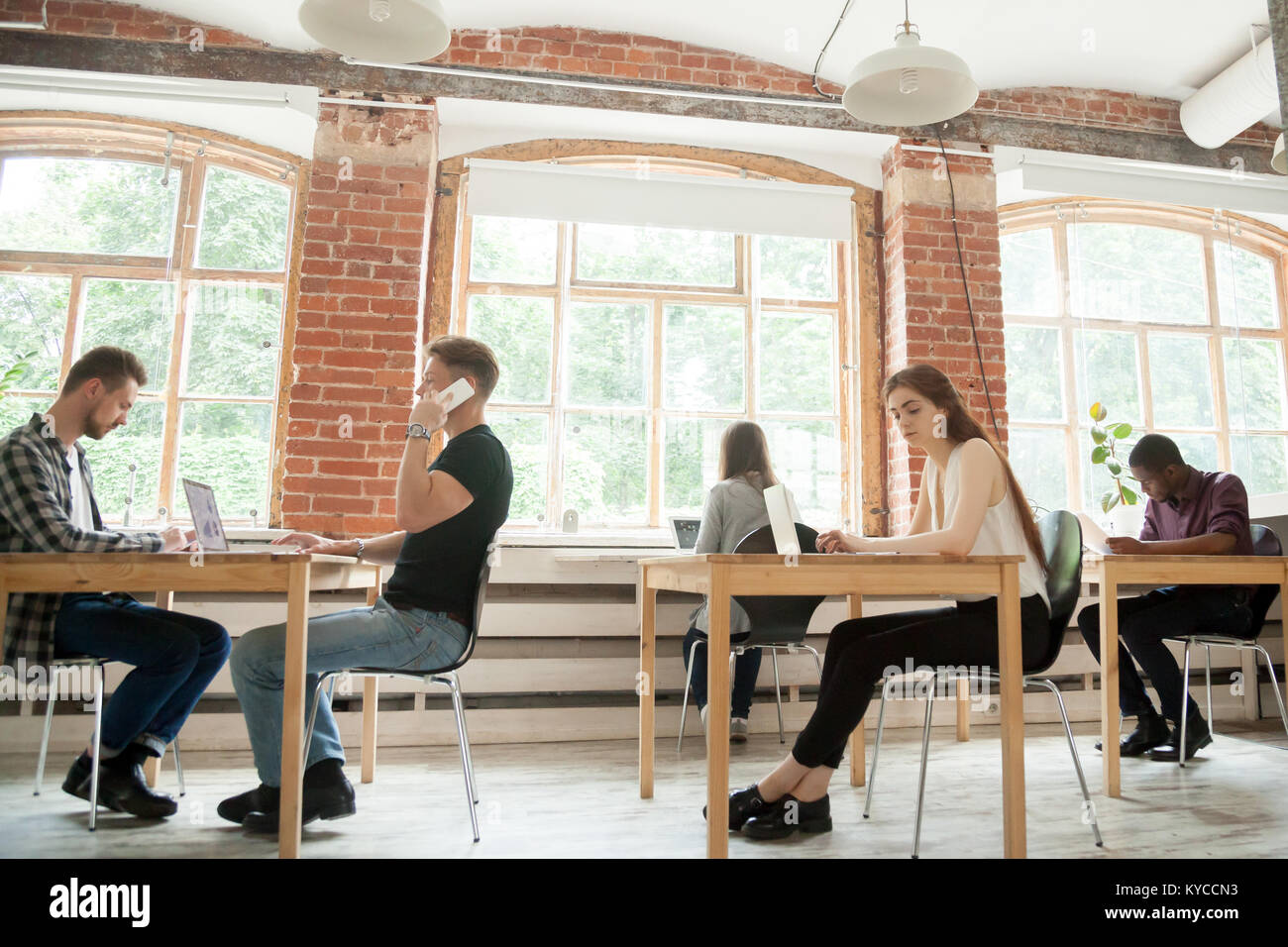 Co-working space concept, diverse people employees working in shared ...