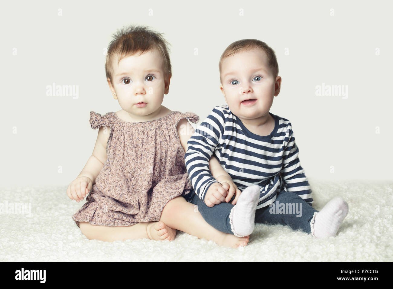 Two Cute Baby. Lovely Friends Stock Photo - Alamy
