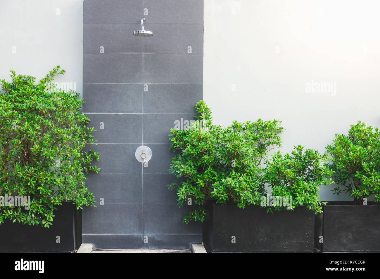 Outdoor rain shower in the beach for swimming pool Stock Photo - Alamy