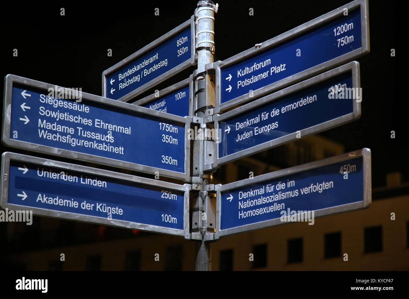 Road signs or street signs at Brandenburg gate in Berlin, Germany Stock ...