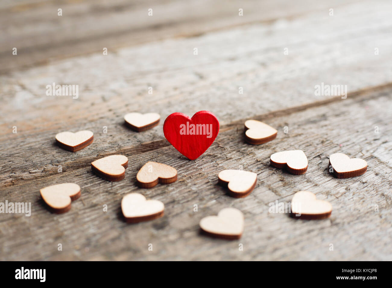 True love concept, Small red heart surrounded with other hearts on ...