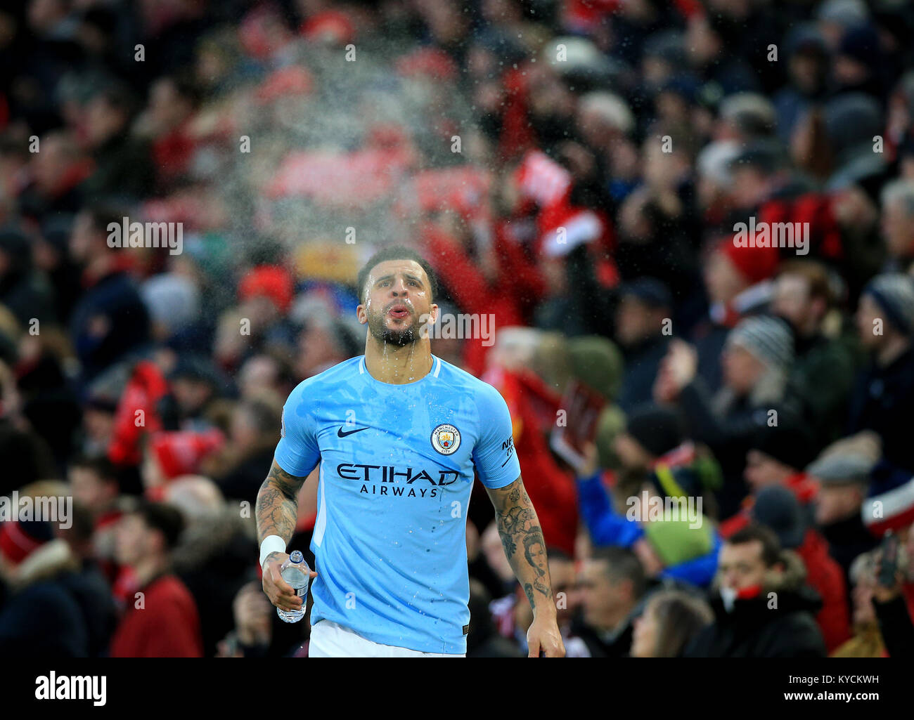 Manchester City's Kyle Walker sprays water from his mouth before the ...