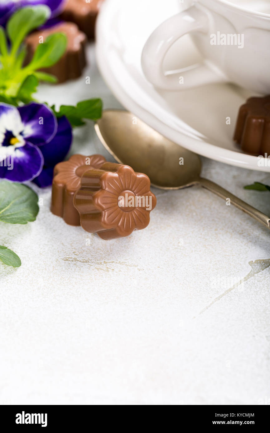 Chocolate candies in flower shape Stock Photo - Alamy