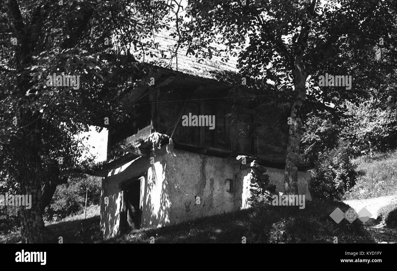 A photograph of the Peterlin granary dated 1813 in Hrastno, Slovenia ...