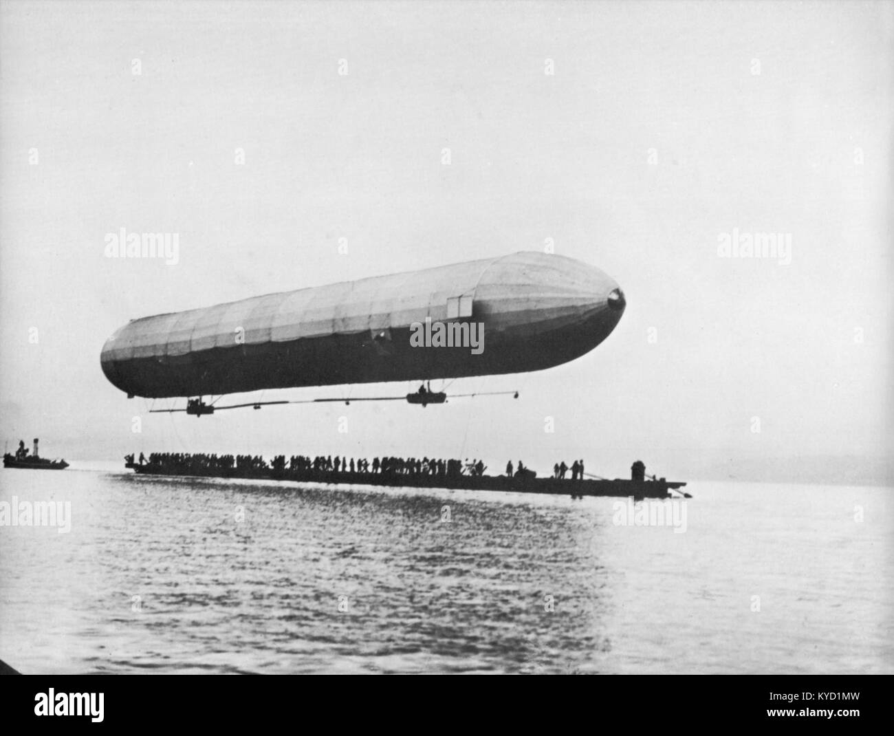 A photograph by Peter Scherer showing a zeppelin airship flying over ...