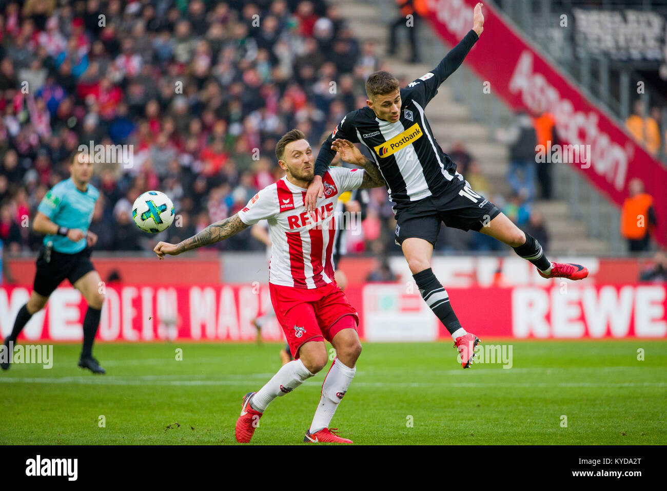 Cologne, Germany. 14th Jan, 2018. Cologne's Marco Hoeger (L) and ...