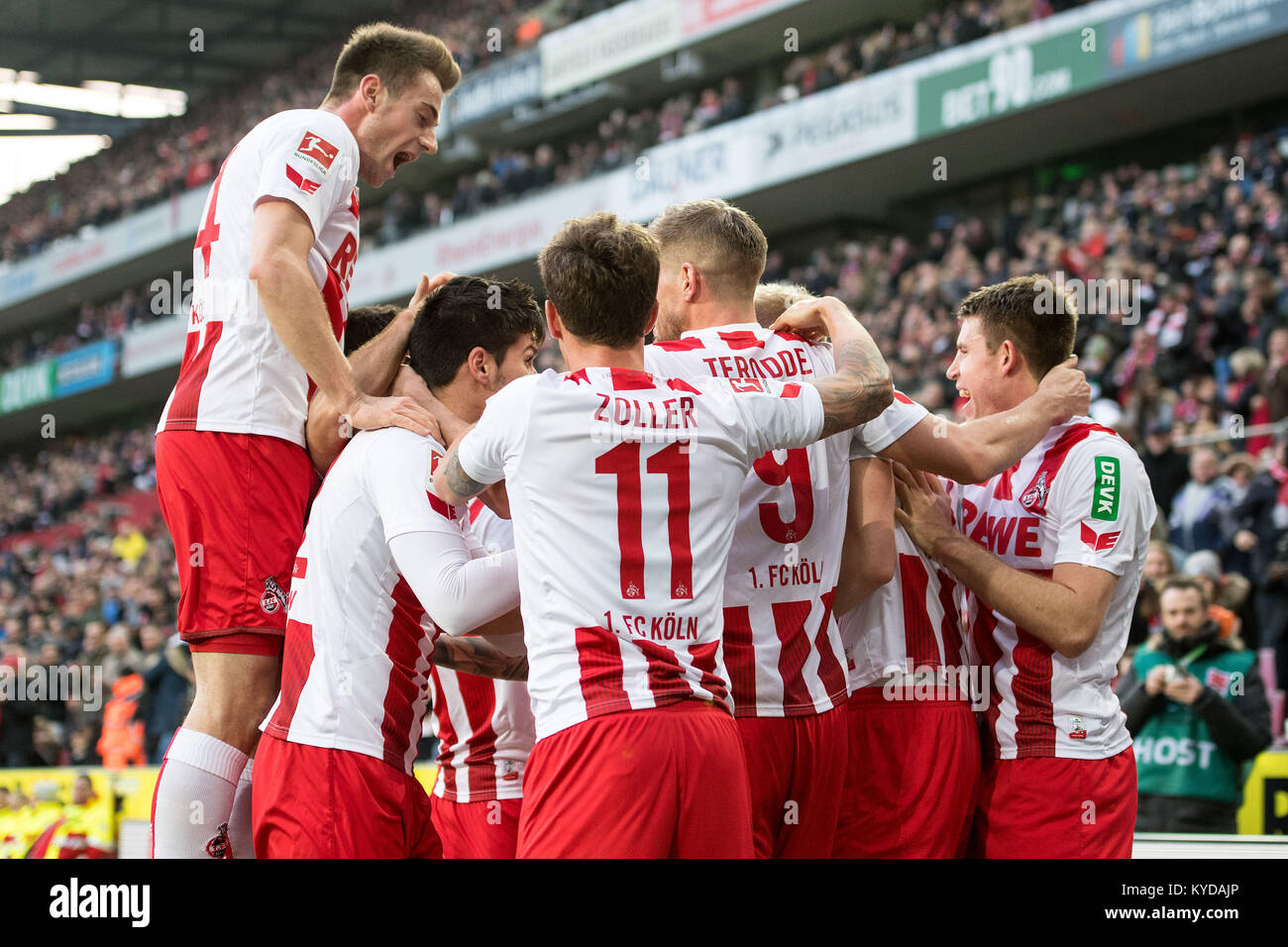 The Cologne players celebrate after the goal for 1:0 during the German ...