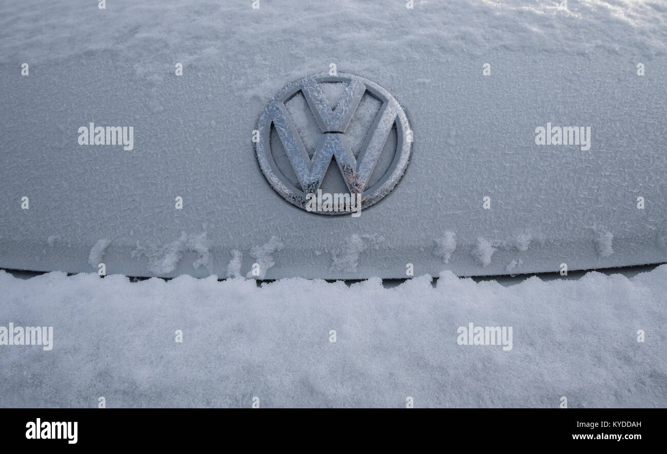 Detroit, USA. 14th Jan, 2018. The logo of a Volkswagen is covered in ...