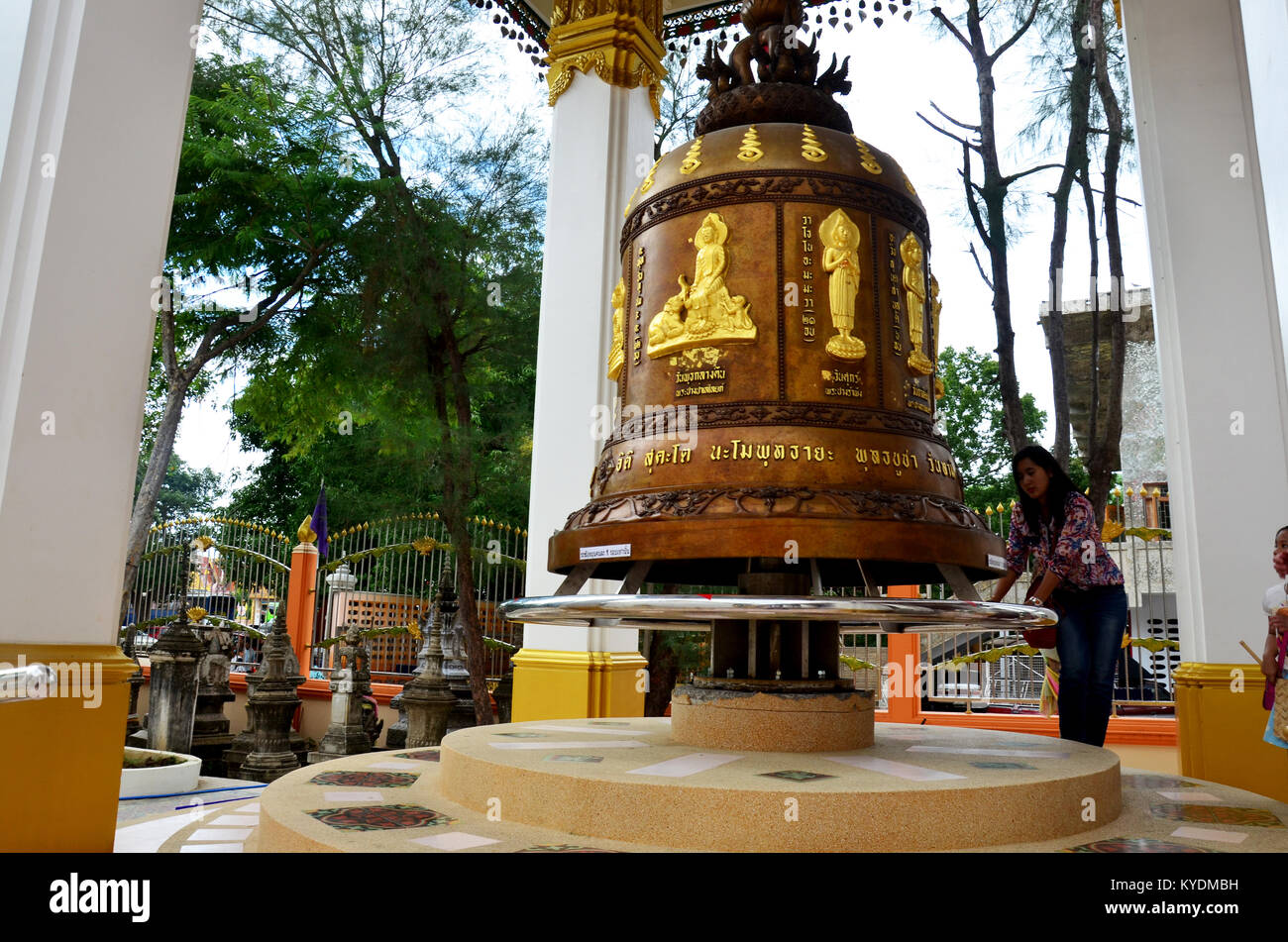 Thai woman people praying and rite rotate and spin big bell for ...