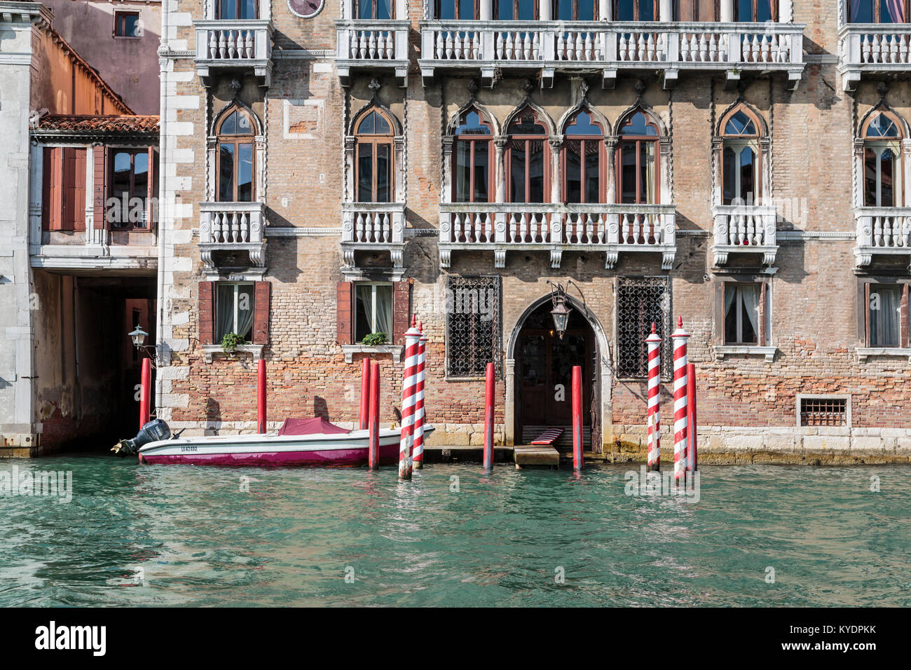 Canal side buildings and gondolas along the Grand Canal in Veneto ...