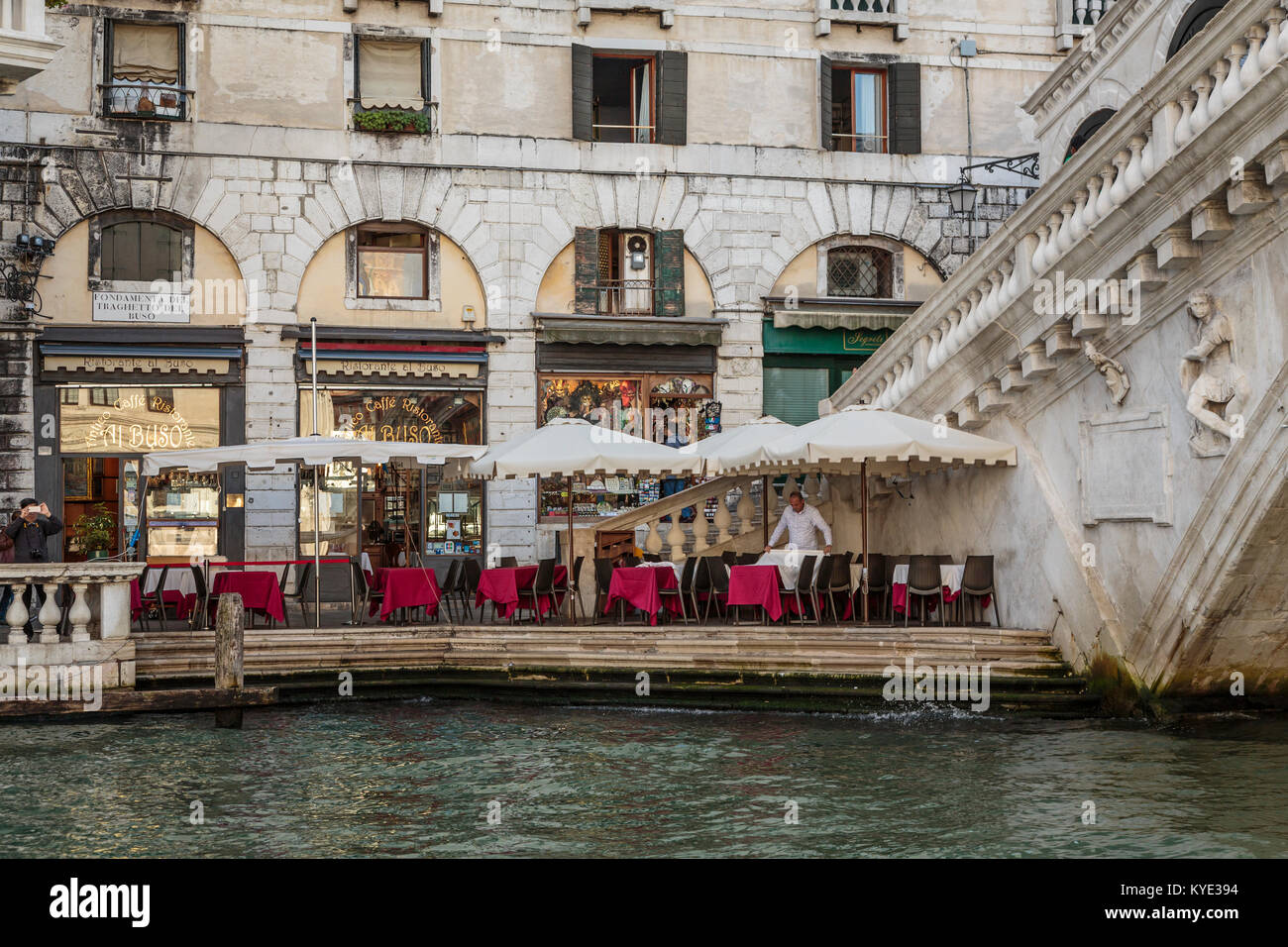 Canal side buildings and gondolas along the Grand Canal in Veneto ...