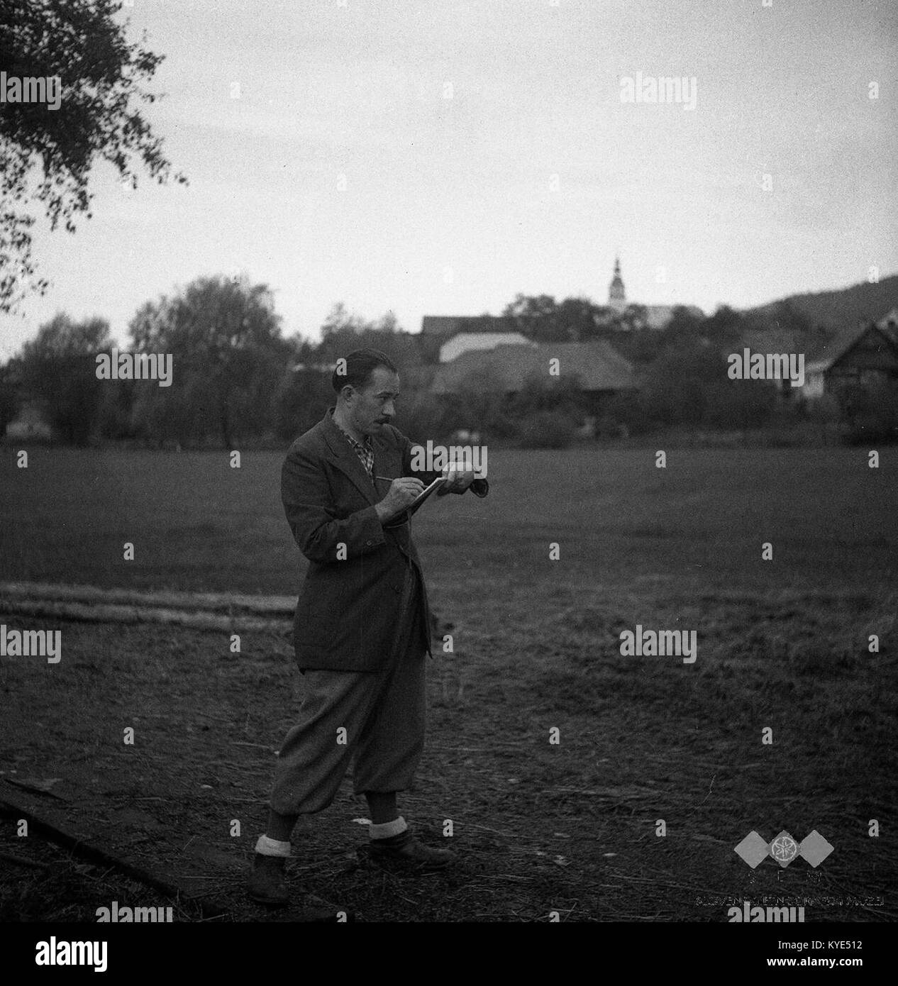 This historical photograph features Tovaris Romih, a member of a work ...