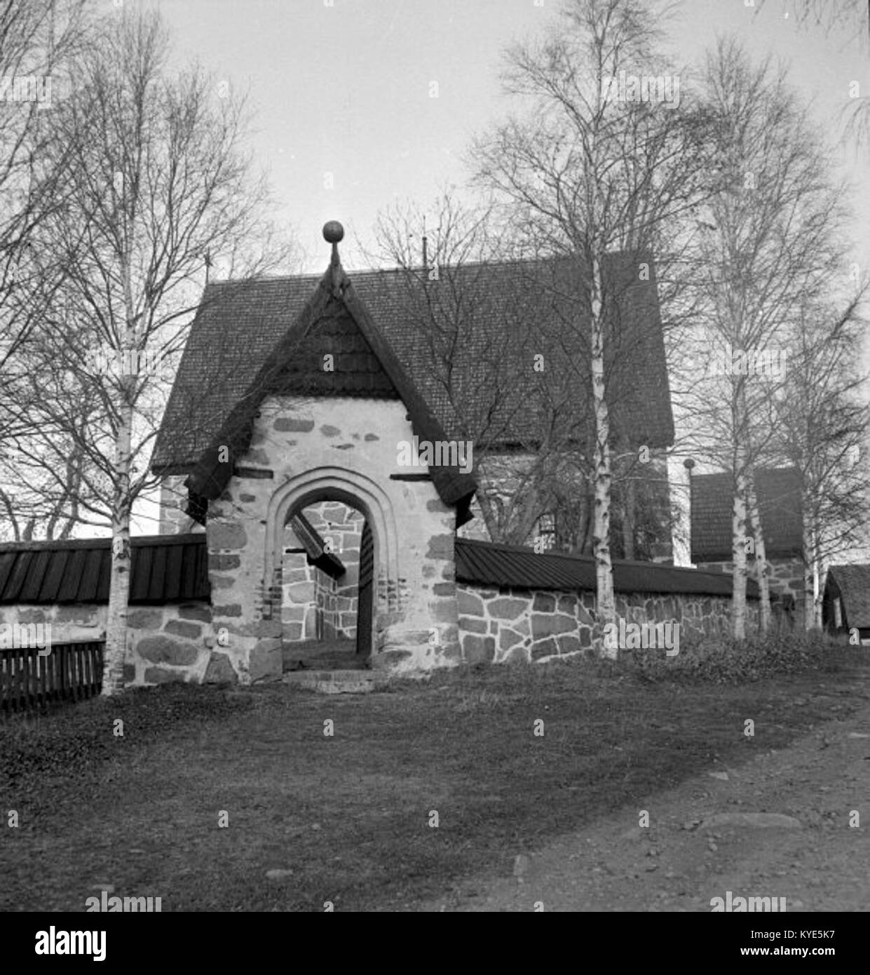 An exterior view of Trönö gamla kyrka in Sweden showing its simple ...