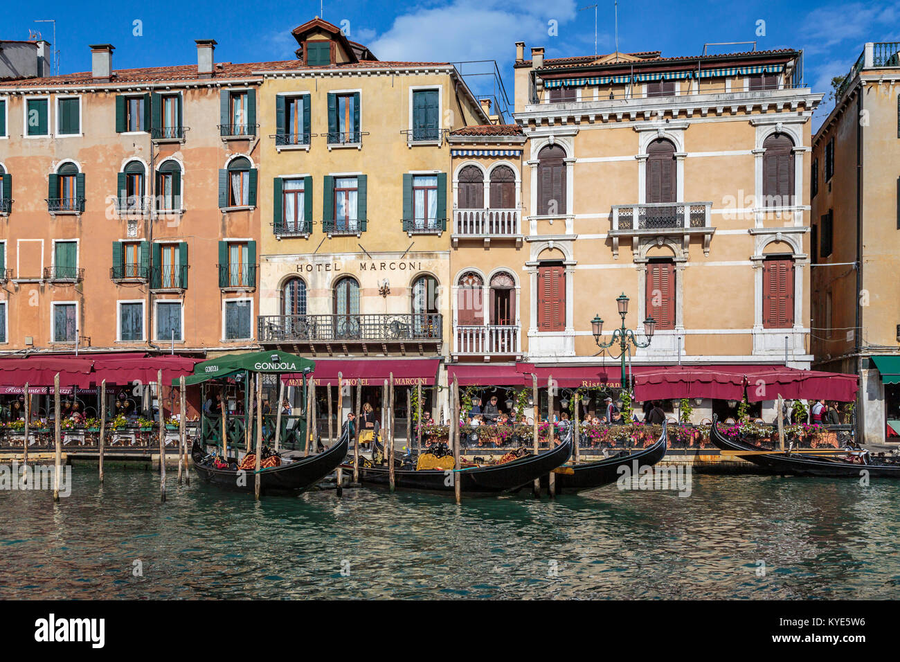 Canal side buildings and gondolas along the Grand Canal in Veneto ...